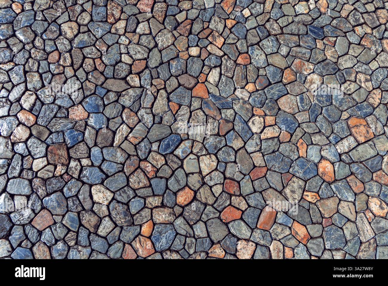 Background featuring an old stone paving composed of small and large ...