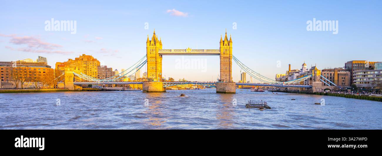 Tower Bridge stands majestically against a colorful sunset in London ...