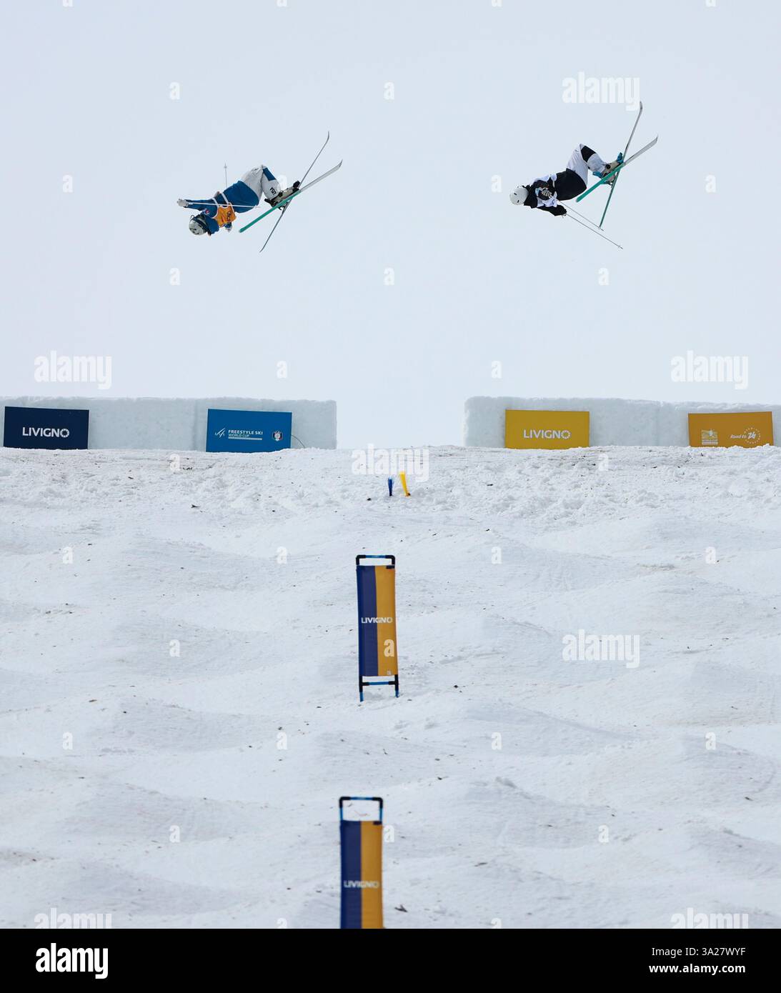 Livigno. 12th Mar, 2025. Jaelin Kauf (L) of the United States competes ...