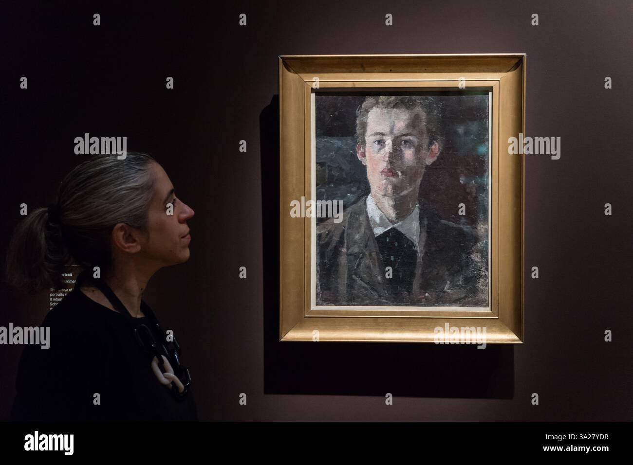 LONDON, UNITED KINGDOM - MARCH 12, 2025: A gallery staff member looks ...