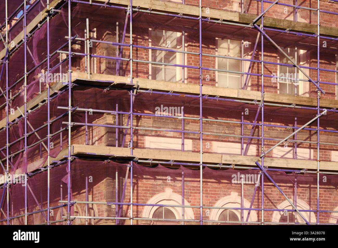 scaffolding erected against an old building Stock Photo - Alamy