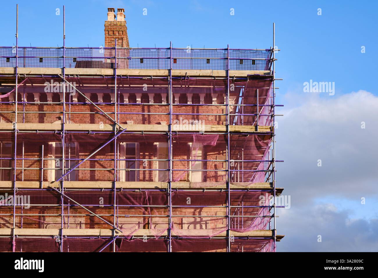 scaffolding erected against an old building Stock Photo - Alamy