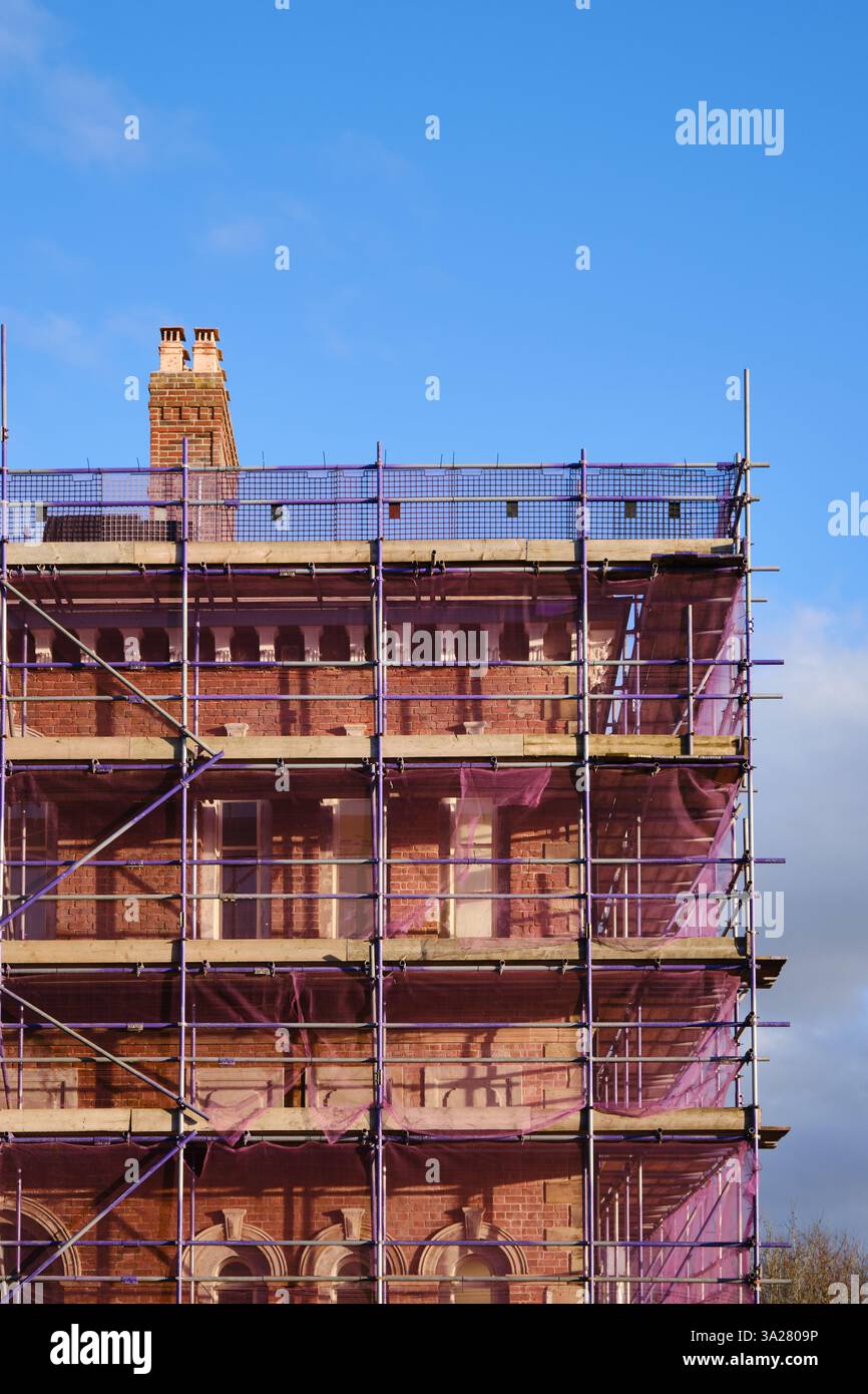 scaffolding erected against an old building Stock Photo - Alamy