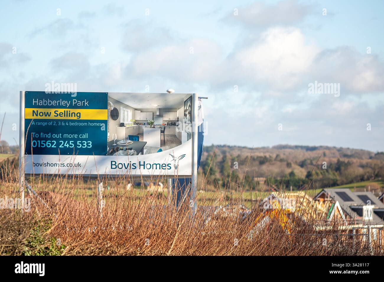 Largr Bovis Homes sign board on the edge of a new house development ...