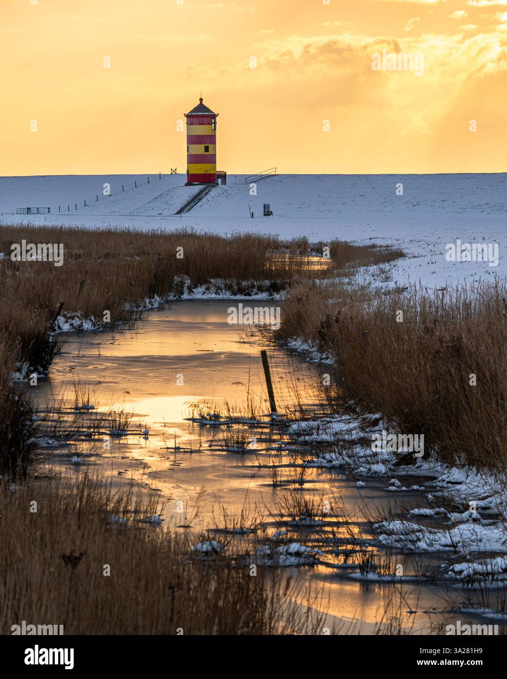 Pilsum, Germany - February 13, 2025: Lighthouse of Pilsum during sunset ...