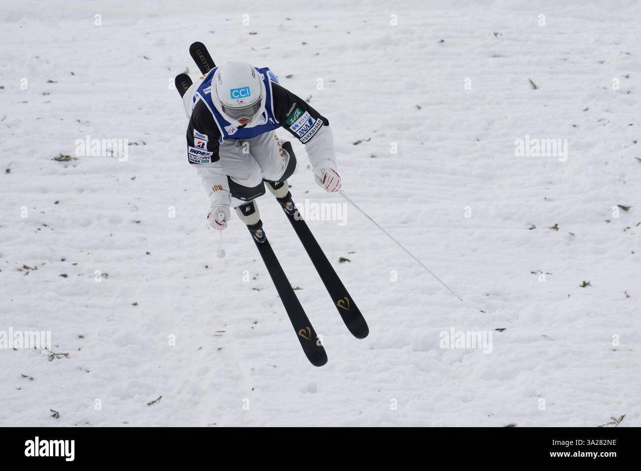 Japan's Ikuma Horishima competes during the men's freestyle skiing dual ...