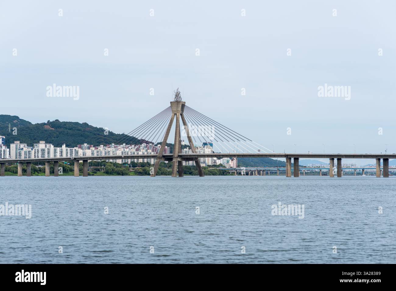 Grand Olympic Bridge, in the shape of the Olympic torch, over the Han ...