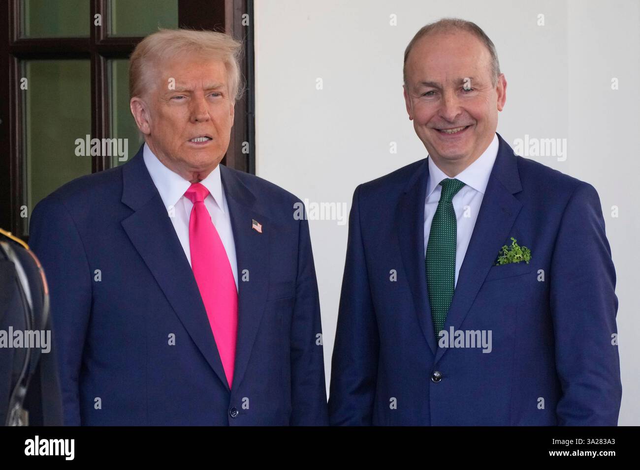 Ireland's Prime Minister Micheál Martin is greeted by President Donald ...