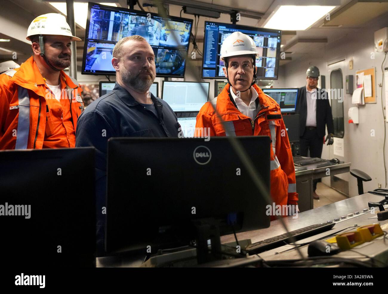 Canadian Prime Minister designate Mark Carney, second right, tours the ...