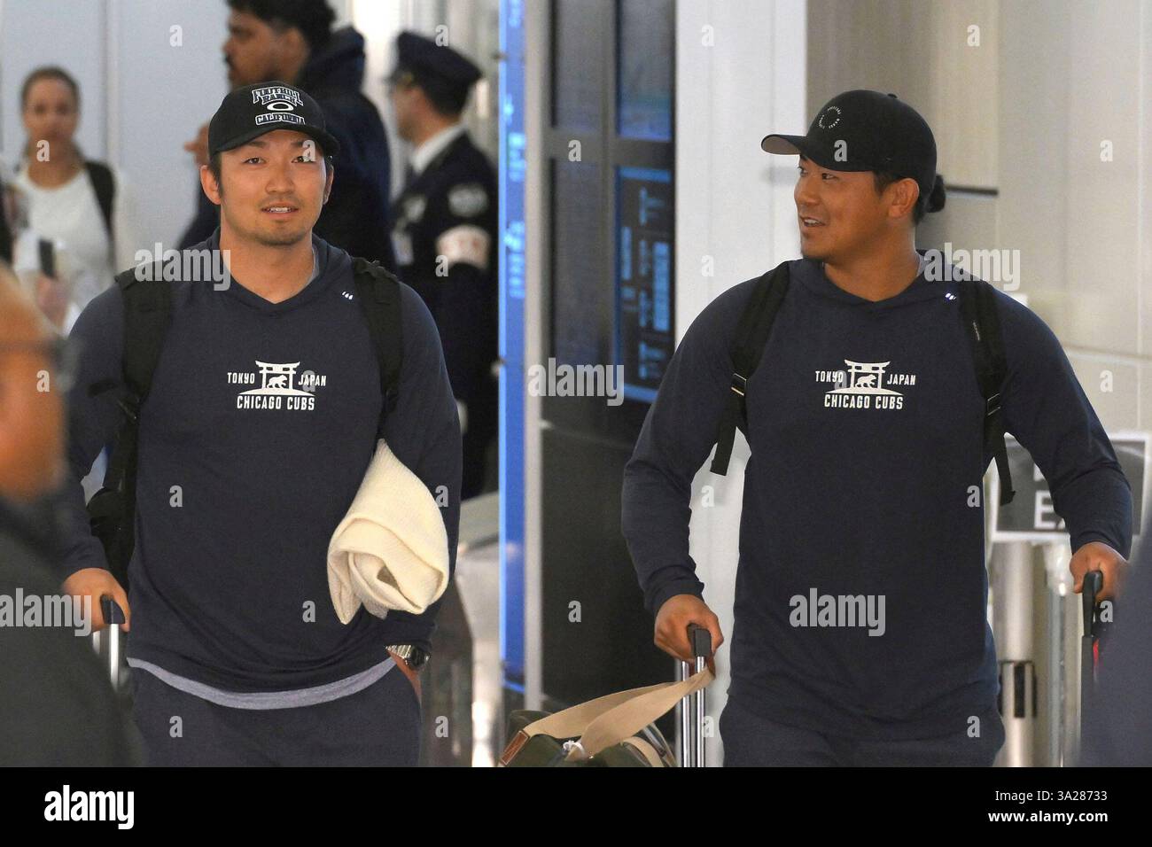 Seiya Suzuki, left, and Shota Imanaga of the Chicago Cubs arrive at ...