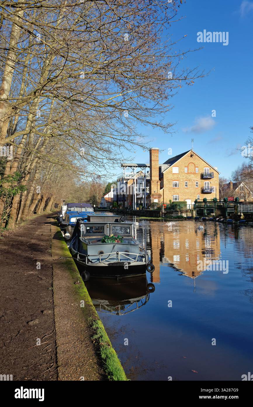 The River Wey navigation canal at Thames lock with waterside modern ...