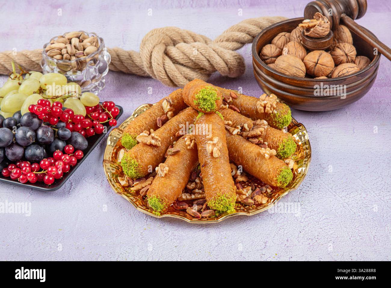Traditional Turkish Dessert 'Erzurum Kadayif Dolmasi' . Stuffed kadayif ...