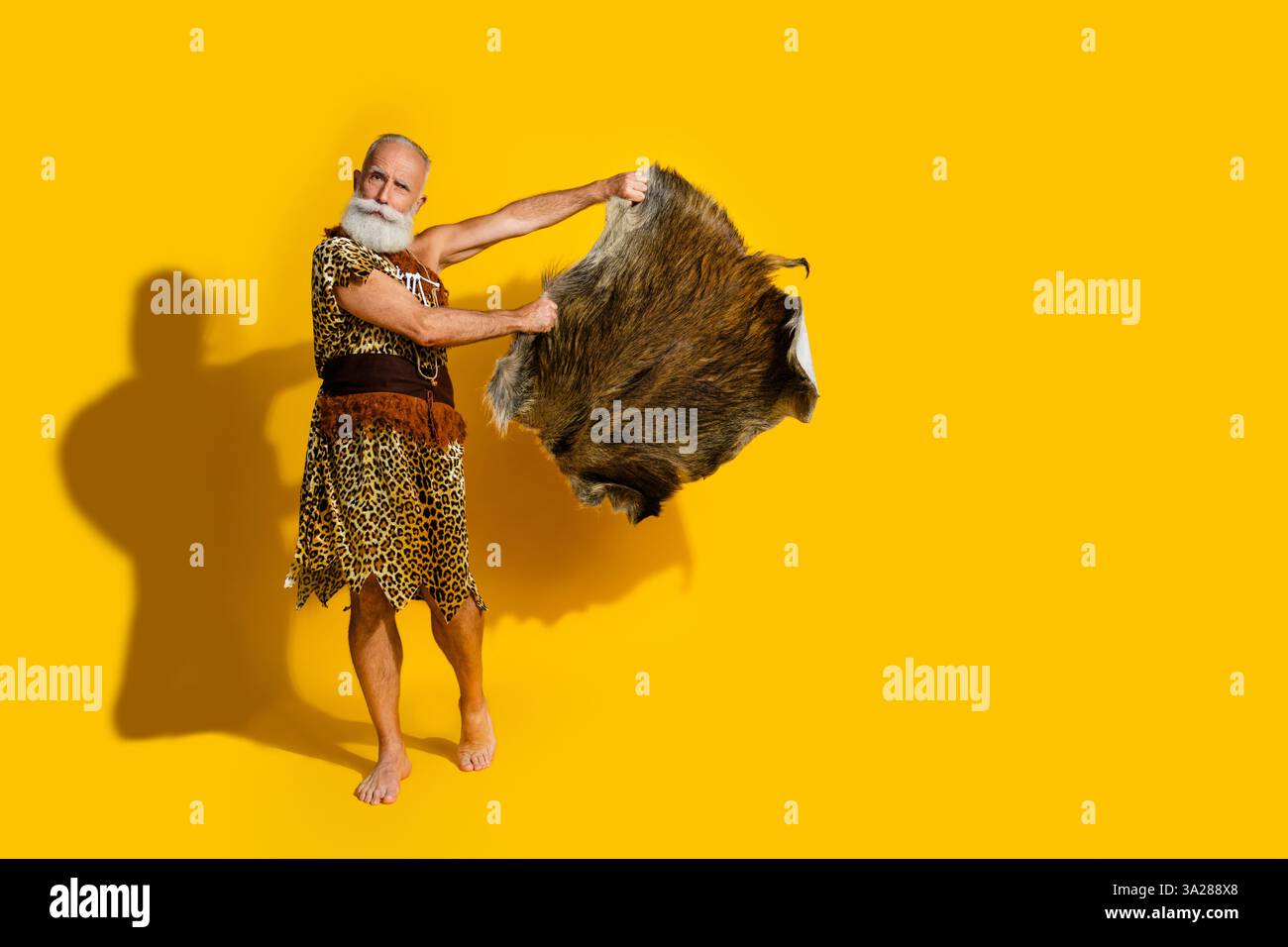Full size photo of ancient aged caveman leopard skin clothes hold ...