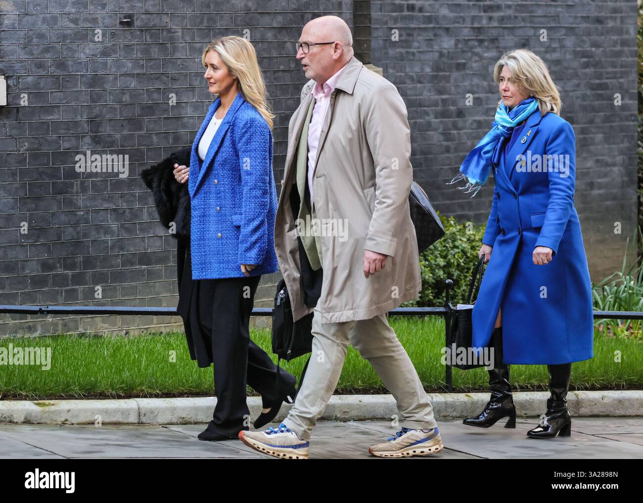 London, UK. 12th March 2025. Katie Amess (front, in blue blazer), Sir ...