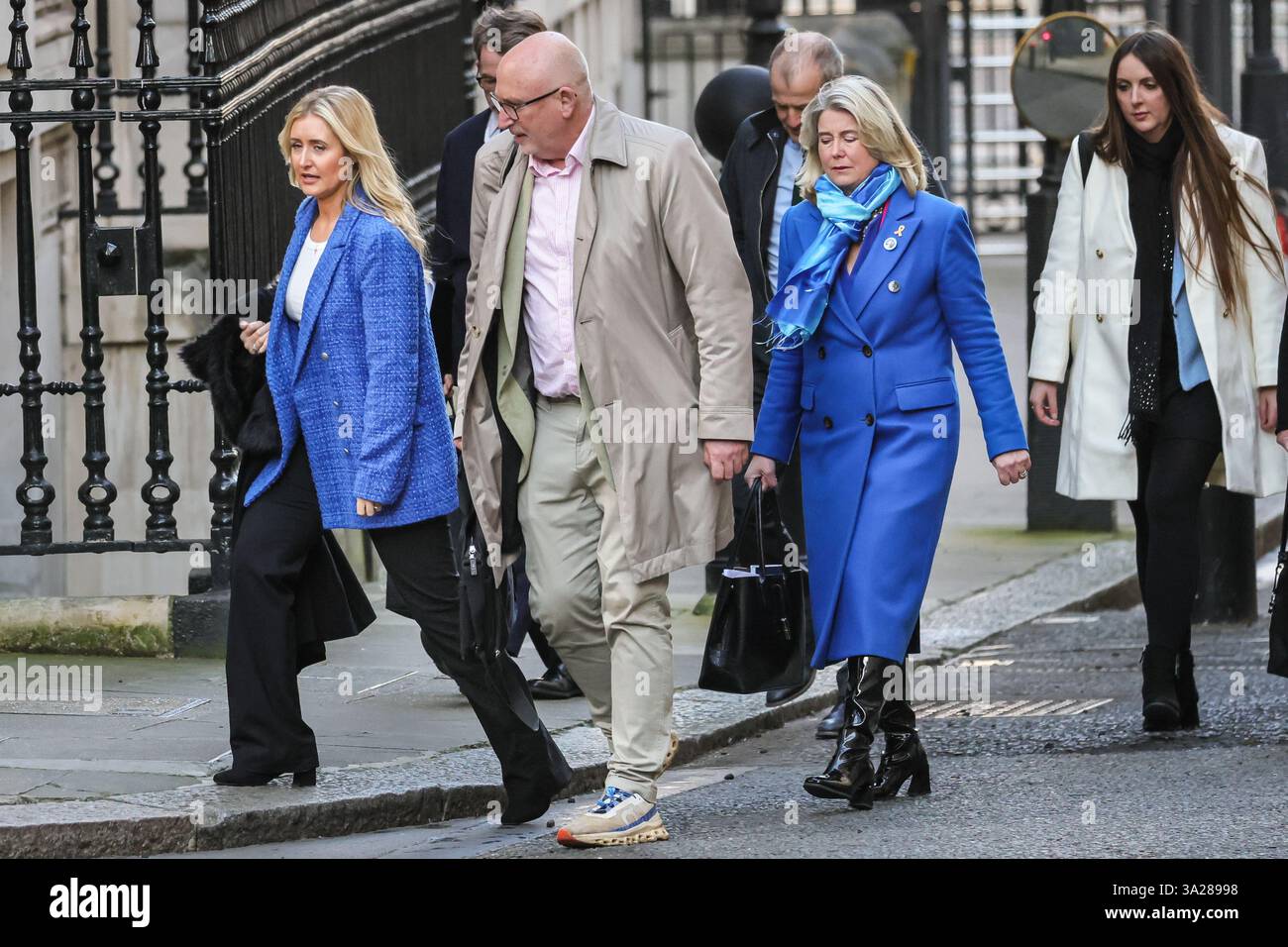 London, UK. 12th March 2025. Katie Amess (front, in blue blazer), Sir ...
