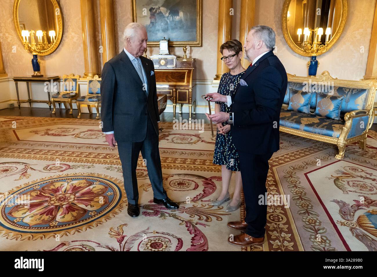King Charles III bestows a new ceremonial sword to the Usher of the ...
