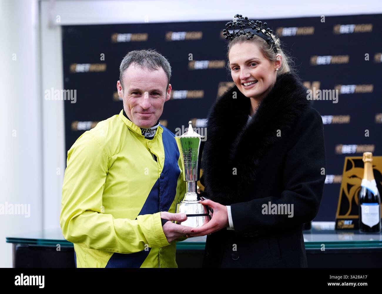 Sean Flanagan and Lauren Flanagan celebrate with the trophy after ...