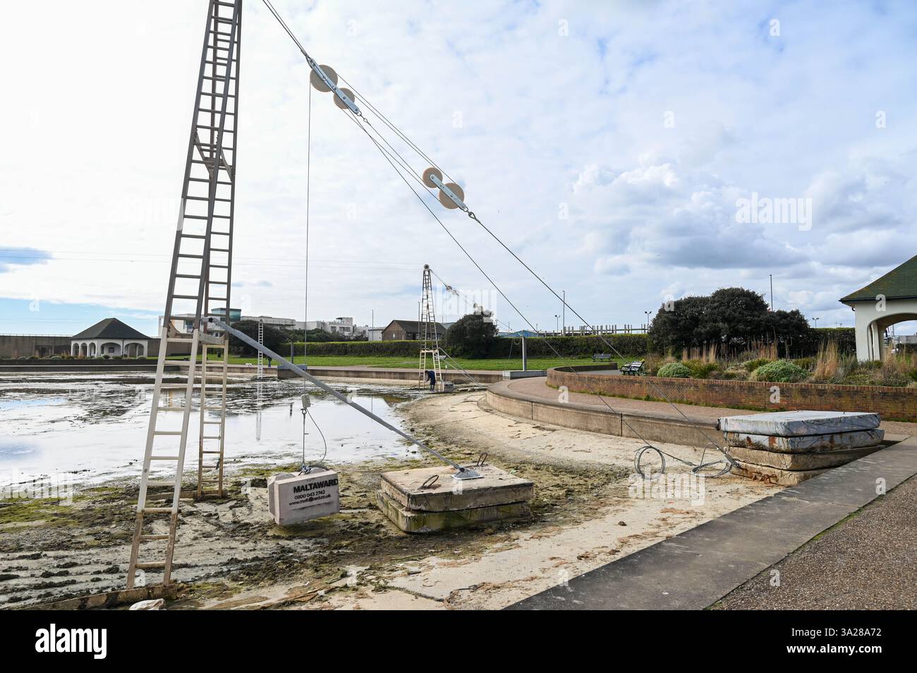 Brighton UK 12th March 2025 - Hove Lagoon drained for maintenance work ...