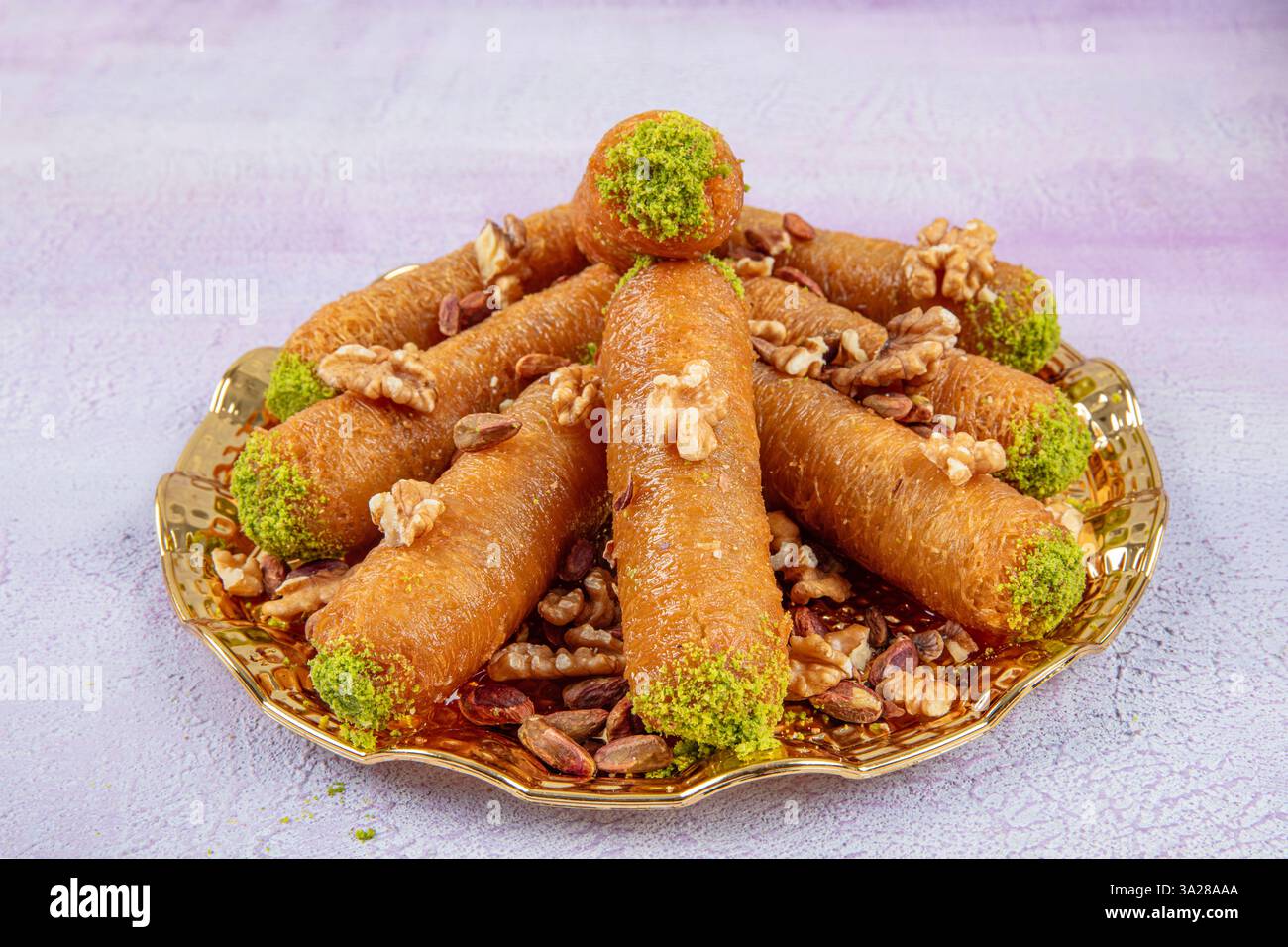 Traditional Turkish Dessert 'Erzurum Kadayif Dolmasi' . Stuffed kadayif ...