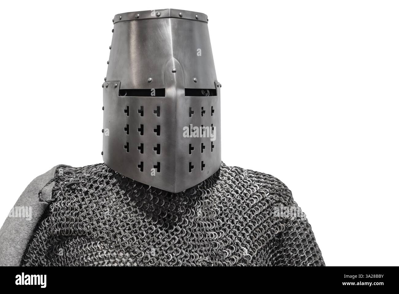 A historic representation of a medieval knight wearing chainmail armour and a great helm ...