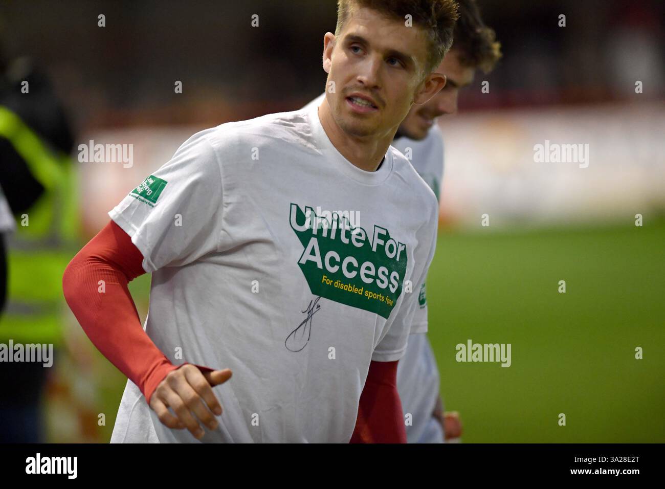 Crawley players wearing Unite For Access shirts before the Sky Bet EFL ...