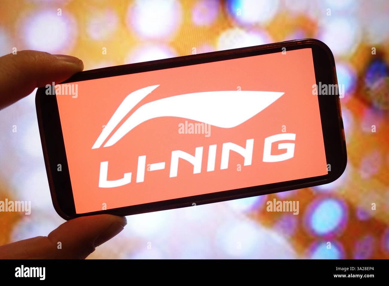 In this photo illustration, the Li-Ning Company logo is seen displayed ...