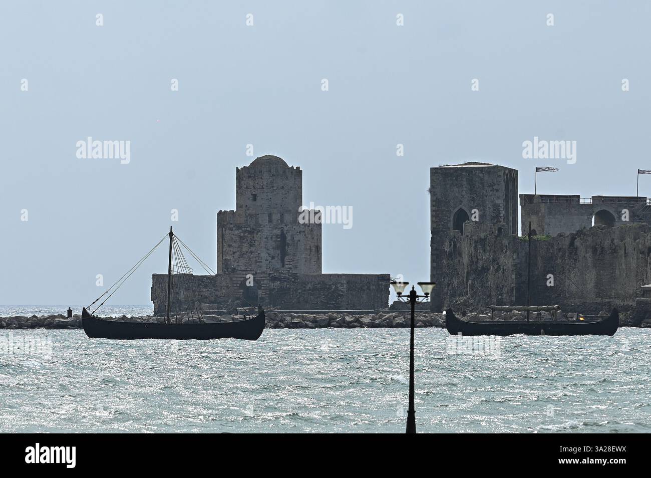 Ships are used on set in front of Methonis Castle for the filming of ...