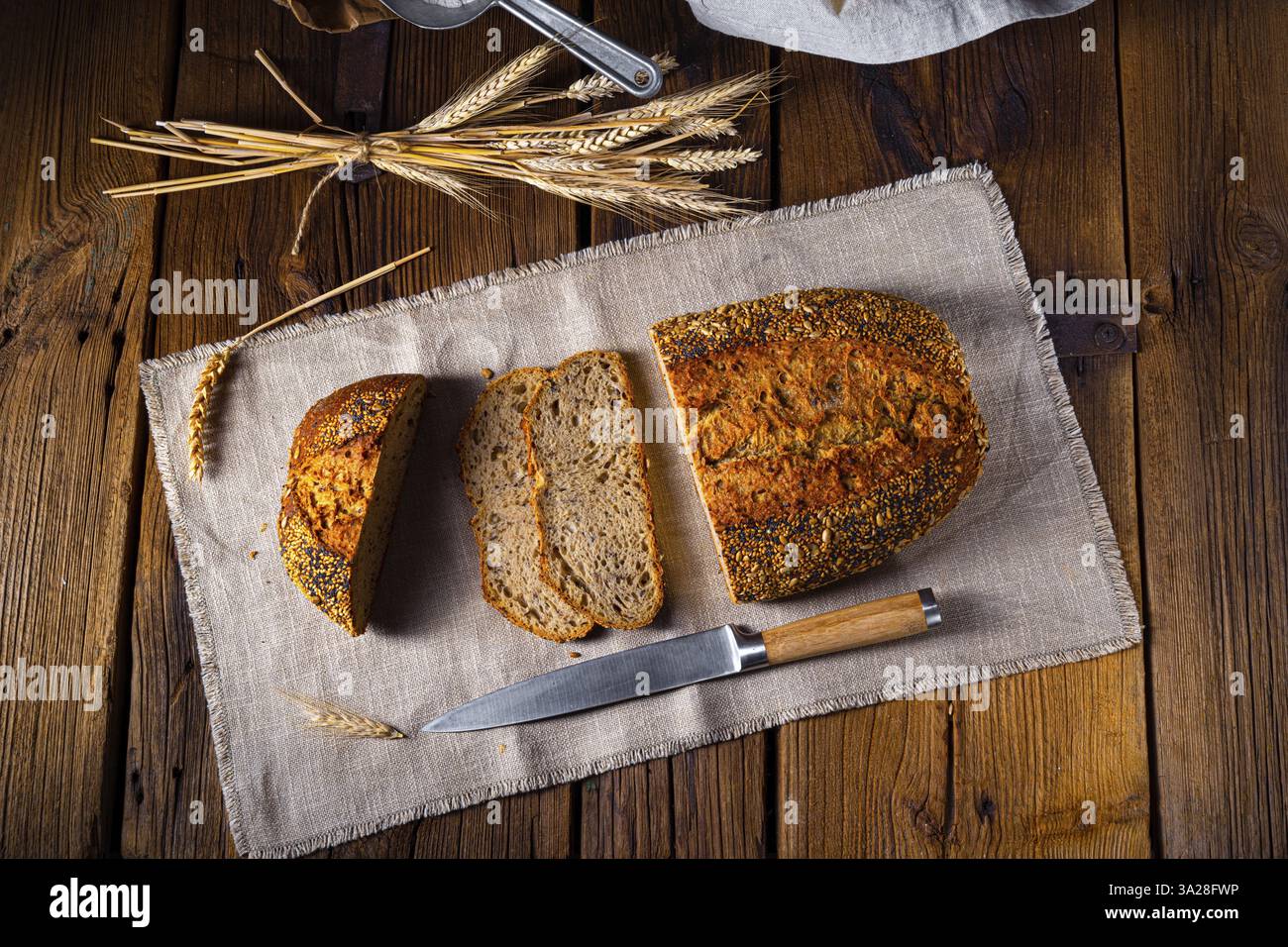 Linseed bread with a poppy seed and sesame mixture Stock Photo - Alamy