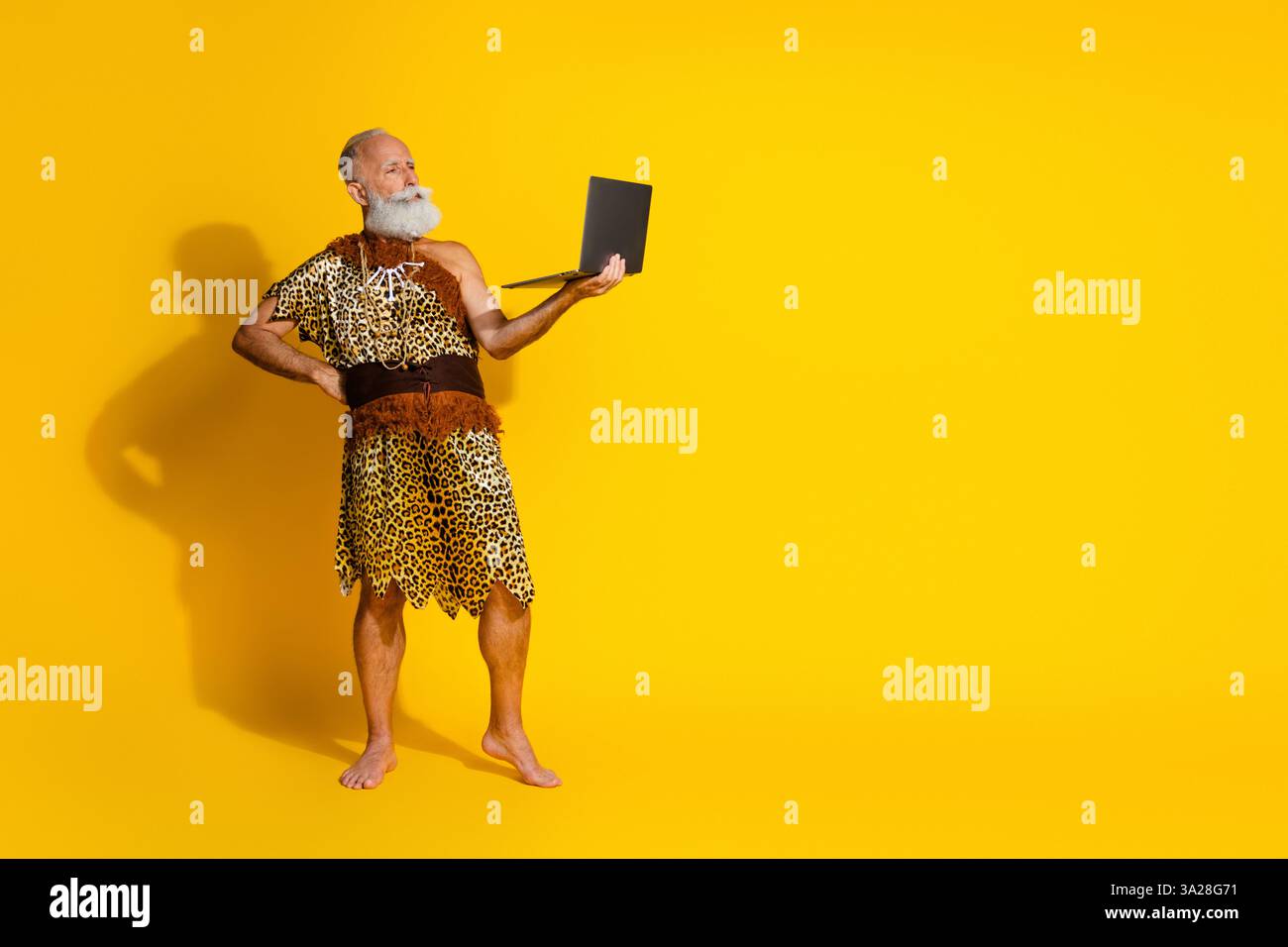 Full size photo of aged savage caveman laptop empty space wear leopard ...