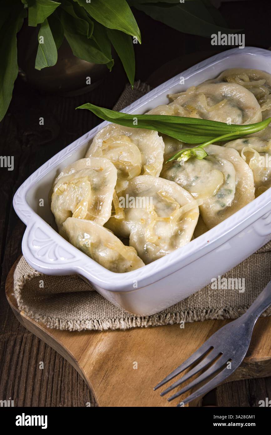 Pierogo with wild knob of cheese filling Stock Photo - Alamy