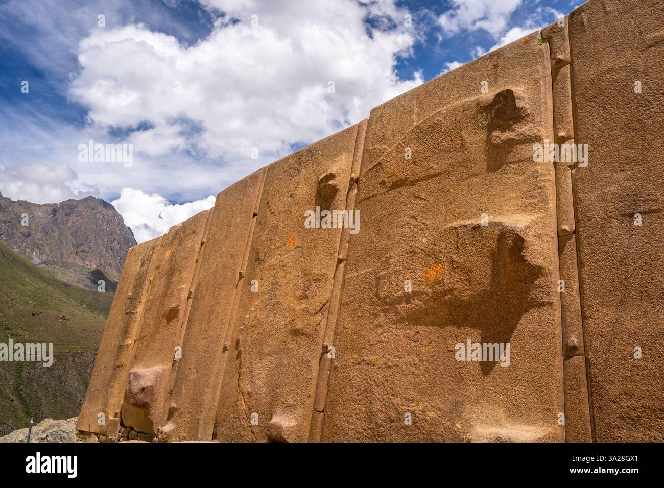 Massive precisely cut stone blocks form a monumental wall at the Inca ...