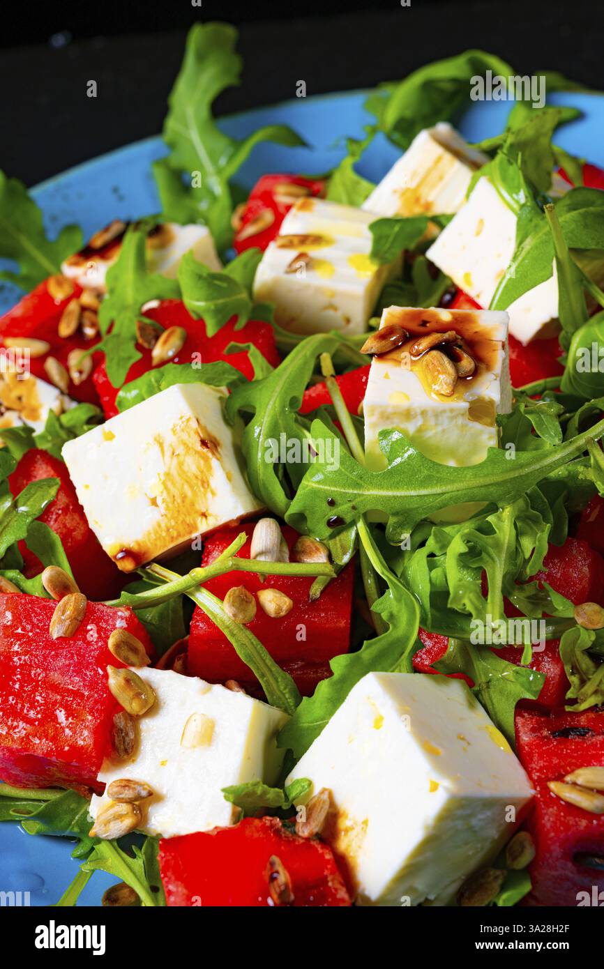 Watermelon salad with rocket and feta cheese Stock Photo - Alamy