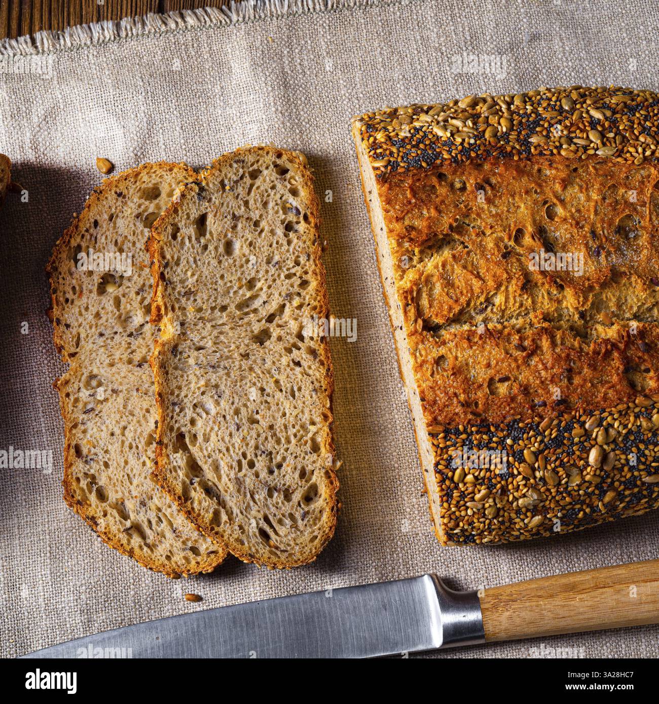 Linseed bread with a poppy seed and sesame mixture Stock Photo - Alamy