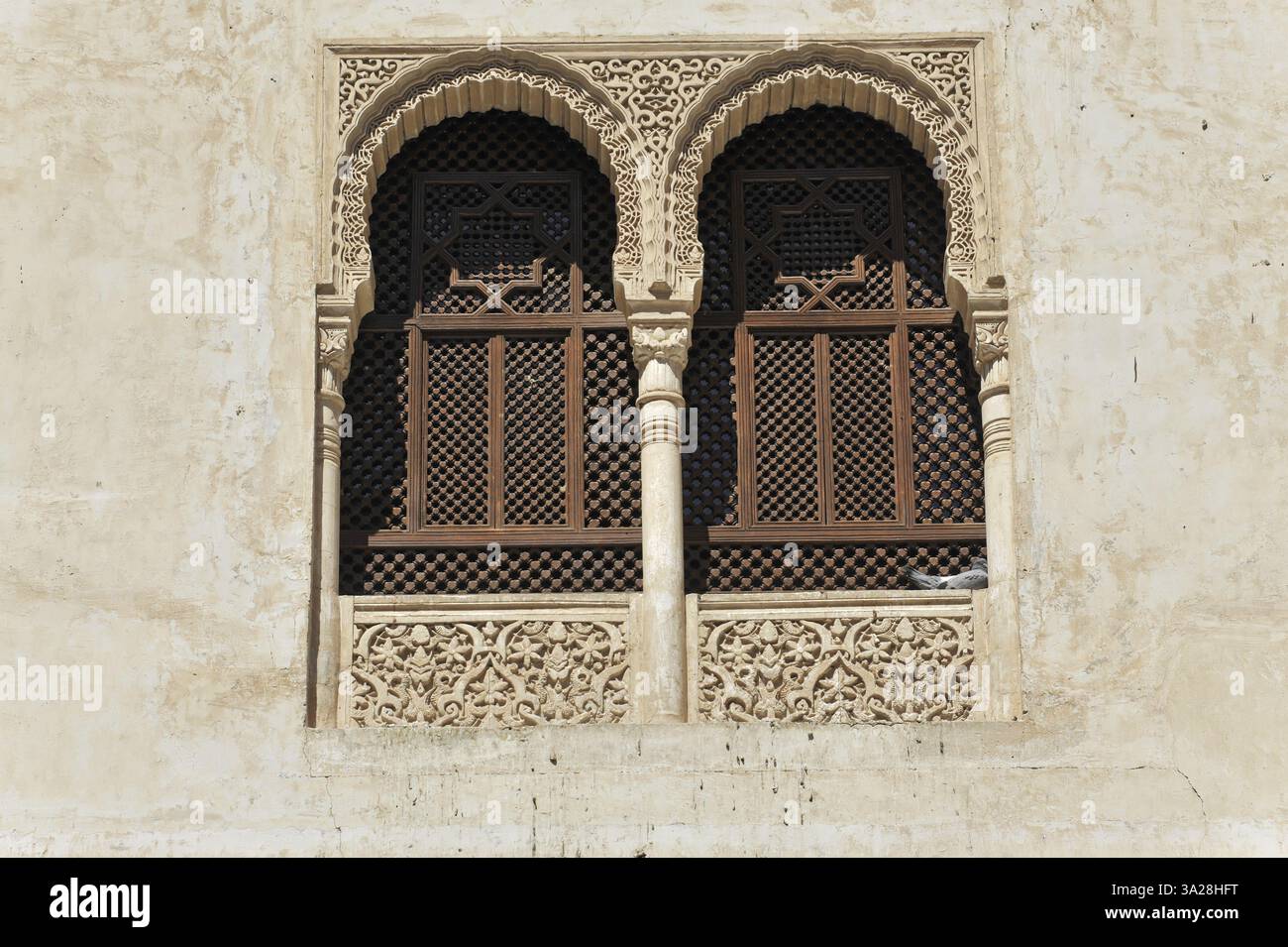 Alhambra, Granada, Andalusia, Spain, Double lancet window with filigree patterns and richly ...