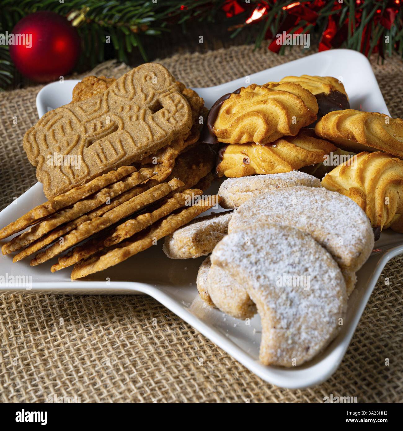 Different types of biscuits with rustic Christmas decorations Stock ...