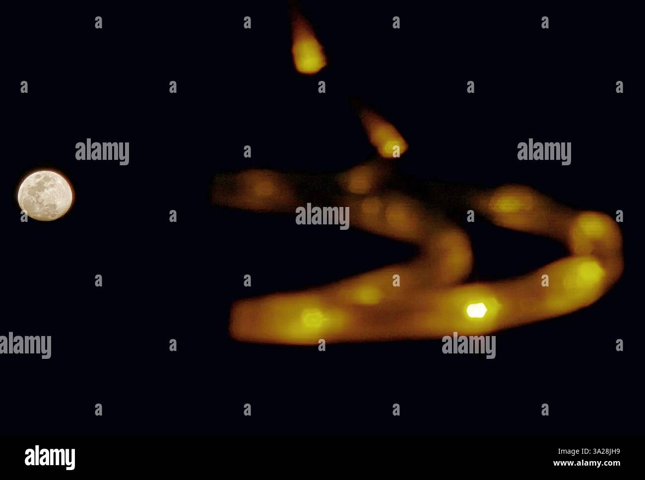 March 12, 2025, Doha, Qatar: The full moon appears on the eleventh day ...