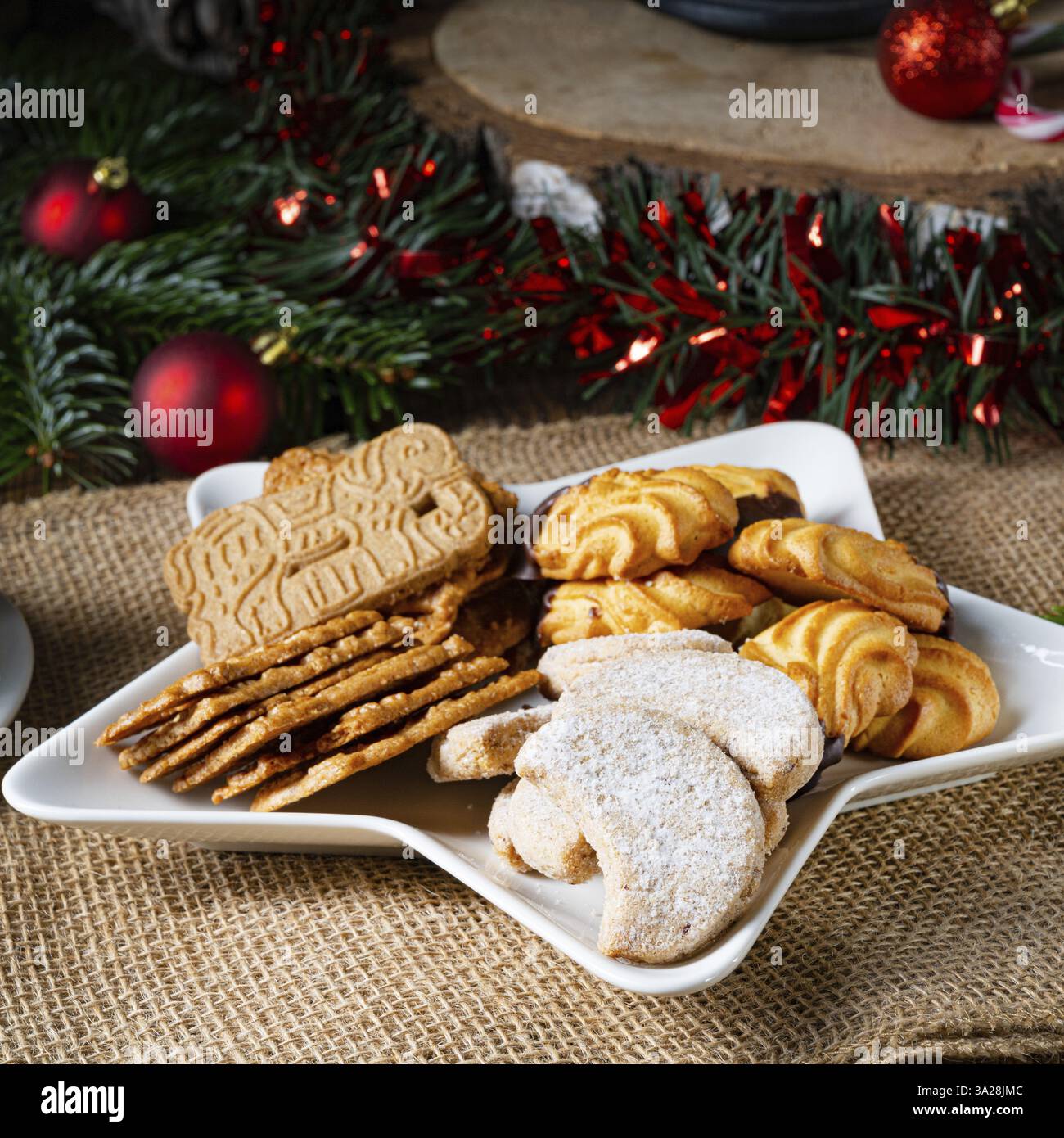 Different types of biscuits with rustic Christmas decorations Stock ...