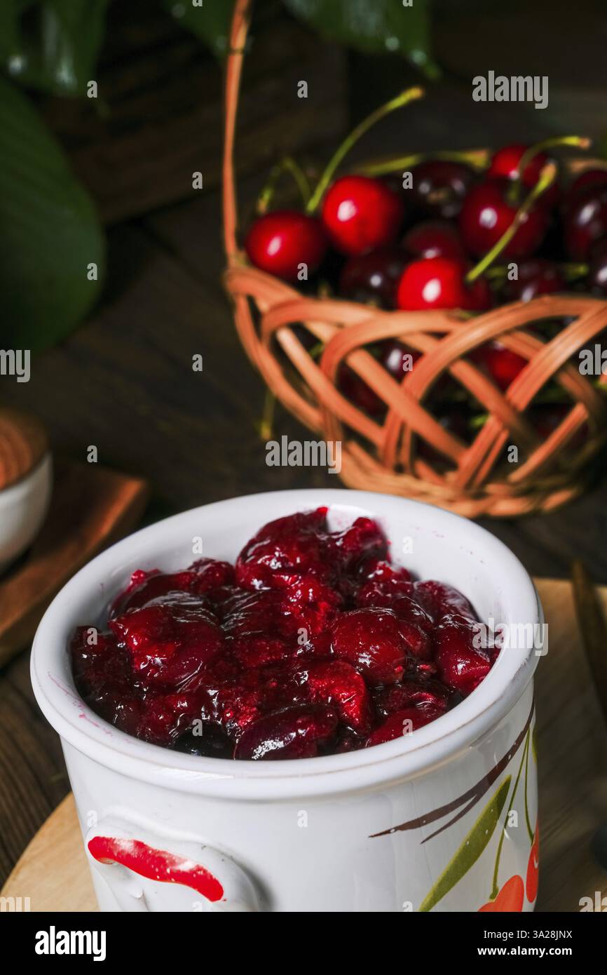 Delicious cherry jam man Stock Photo - Alamy