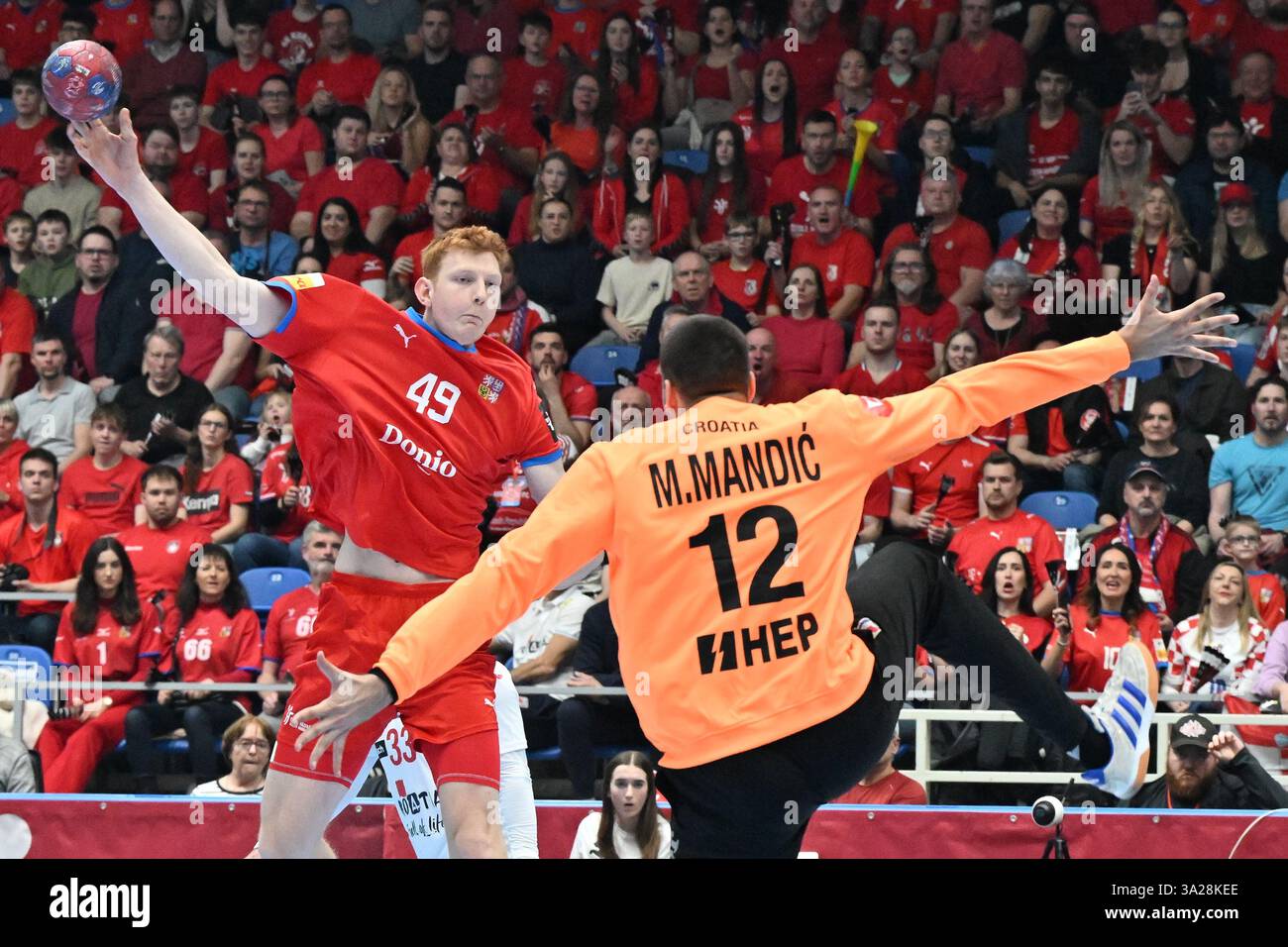 L-R Daniel Blaha (CZE) and goalkeeper Matej Mandic (HR) in action ...