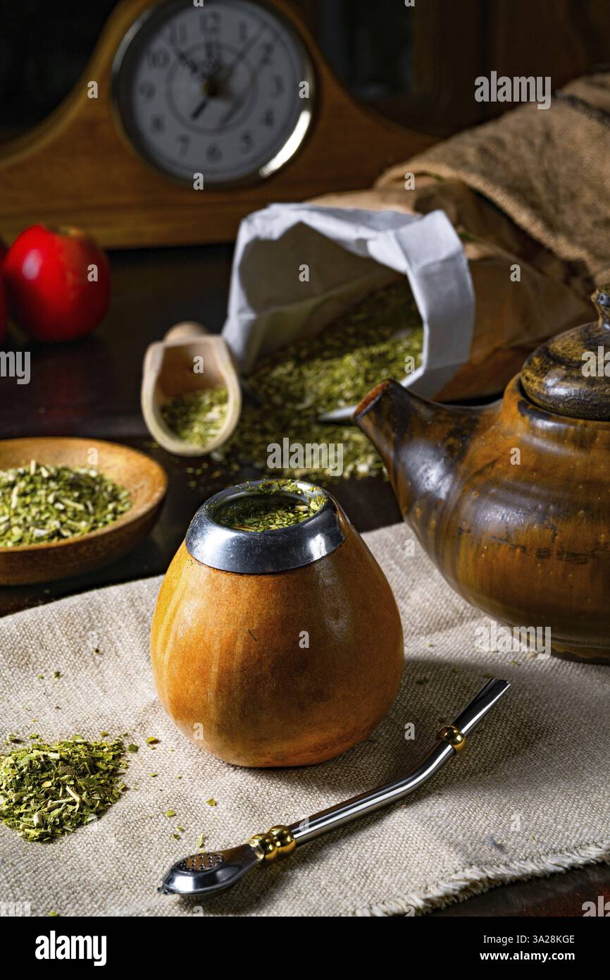 Prepare yerba mate with calabash and bombilla Stock Photo - Alamy