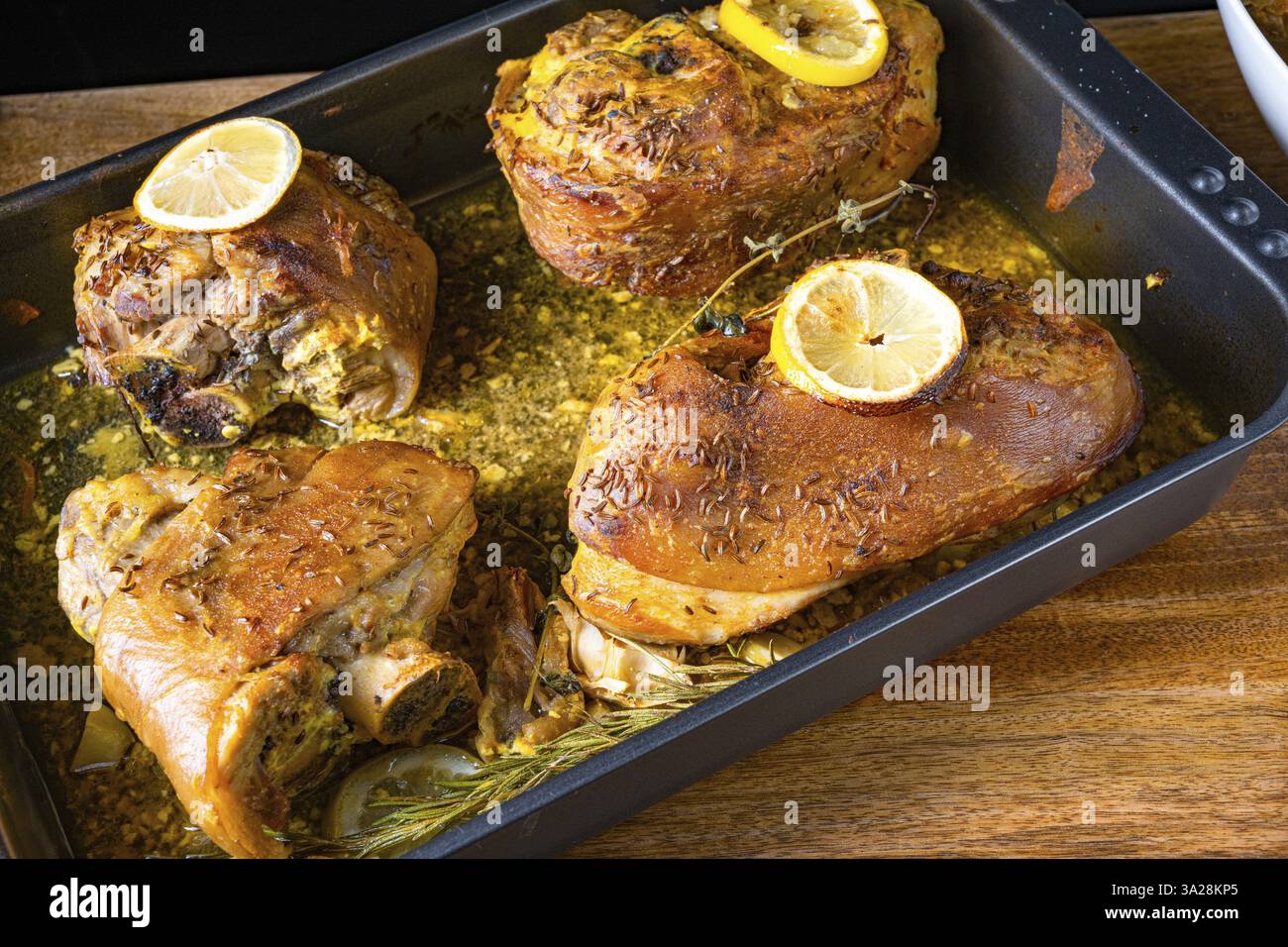 Crispy roasted pork bones from the oven Stock Photo - Alamy