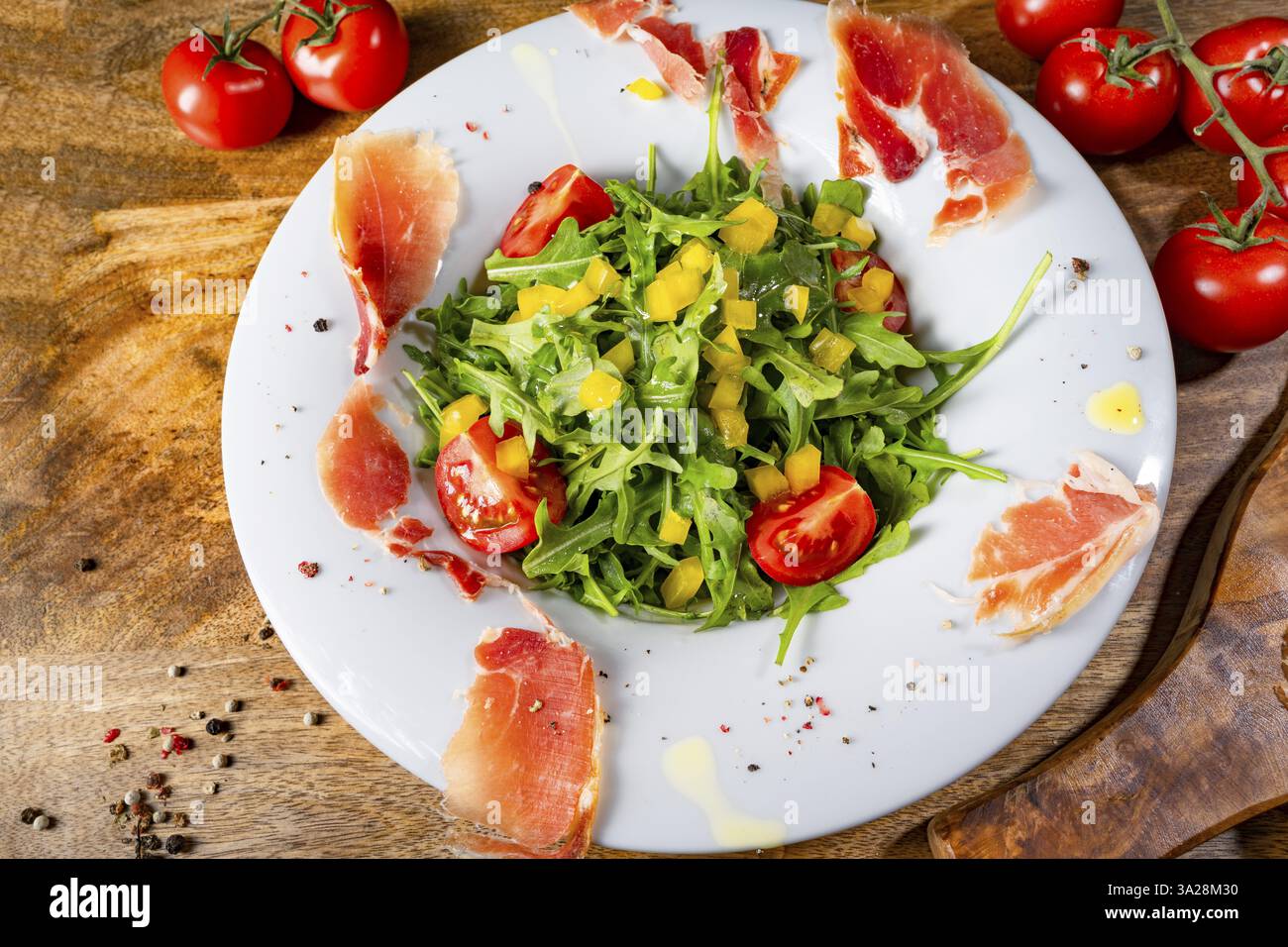 Rocket salad with dried Spanish ham Stock Photo - Alamy