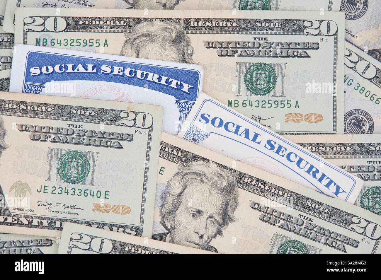New and Old style Social Security cards with 20 dollar bills. SS number ...