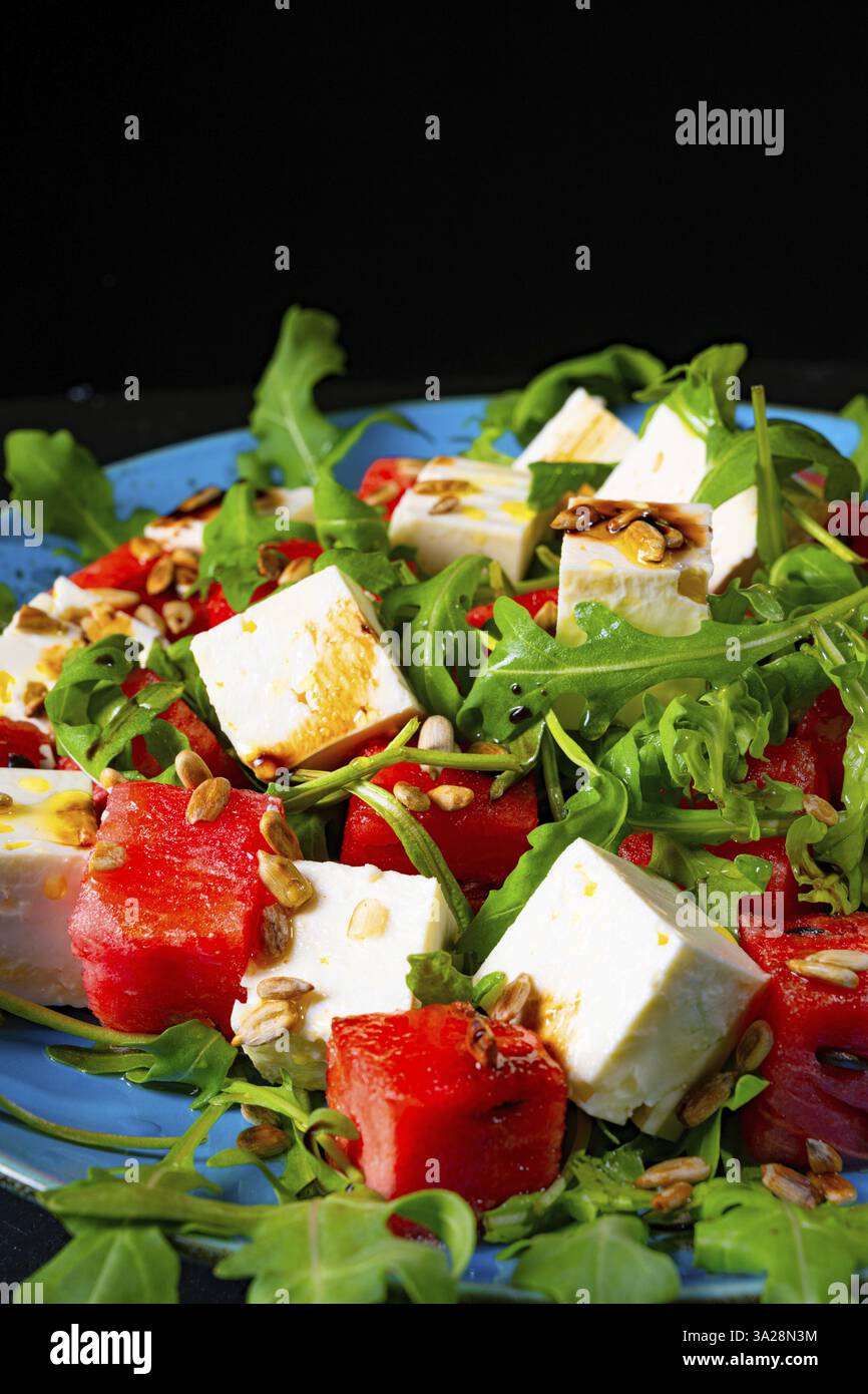Watermelon salad with rocket and feta cheese Stock Photo - Alamy