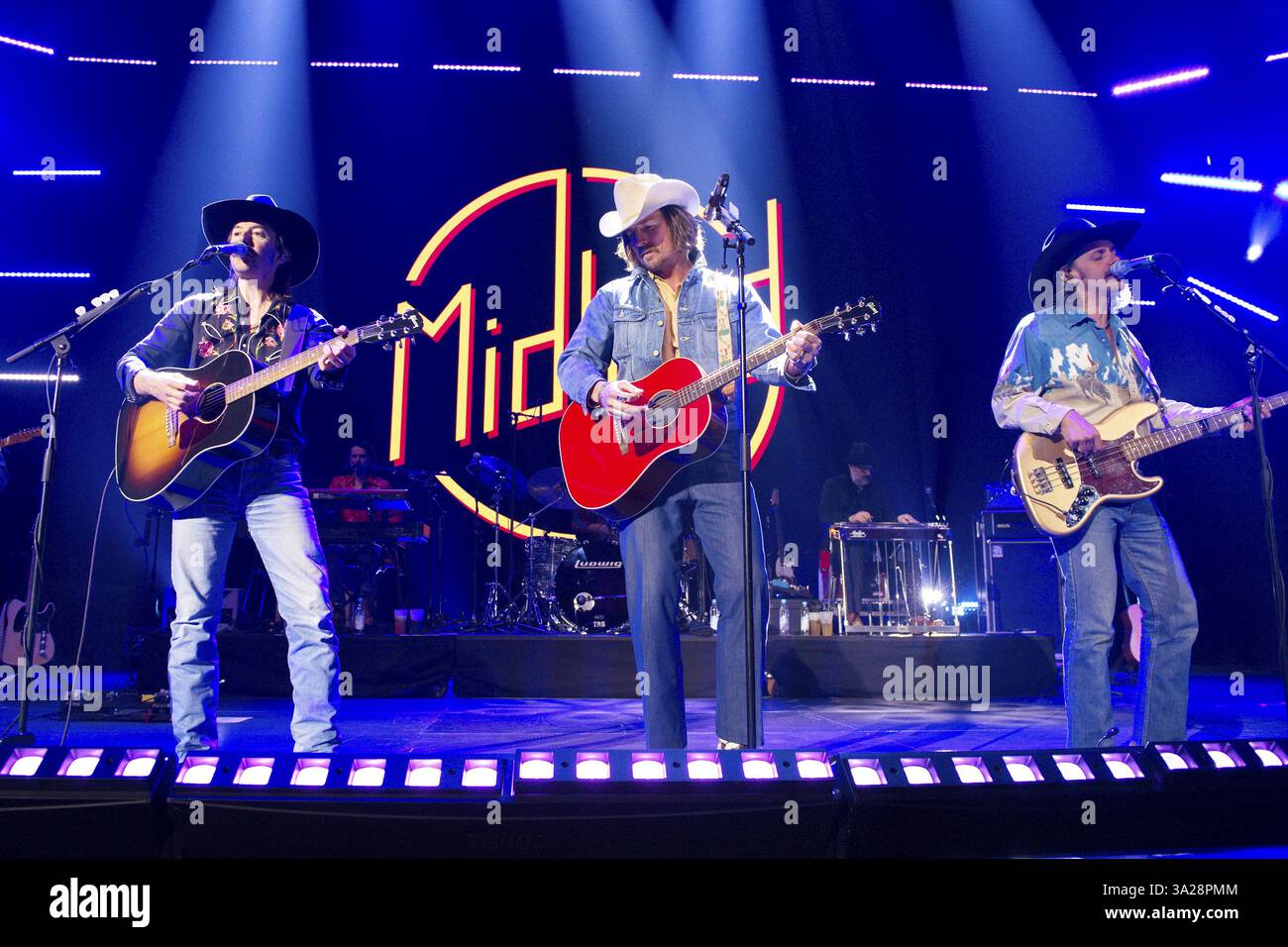 Jess Carson (guitar, vocals), Mark Wystrach (vocals, guitar), Cameron ...