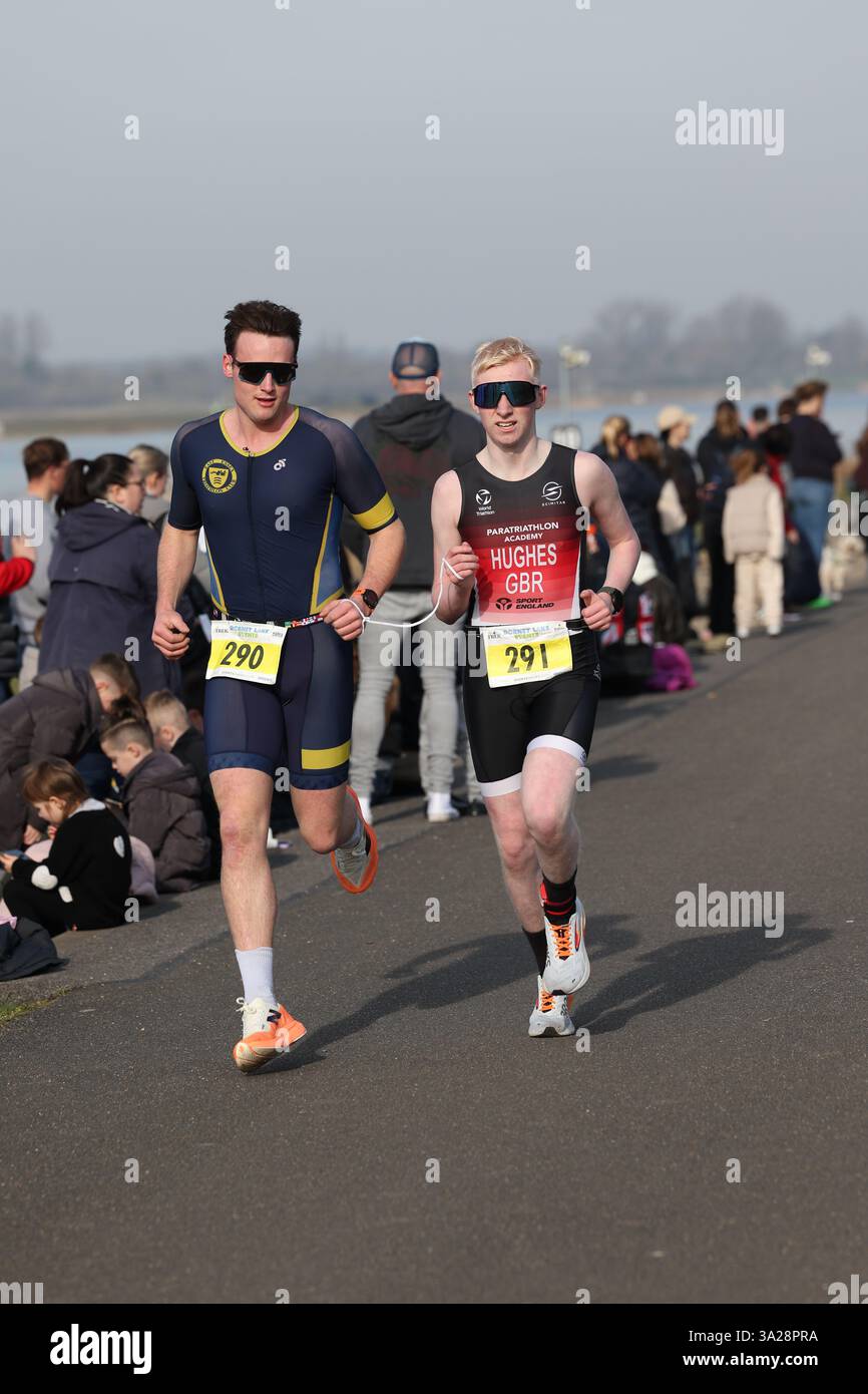 Harry Hughes being guided by Ben Brooks in the Super Spring Duathlon in ...