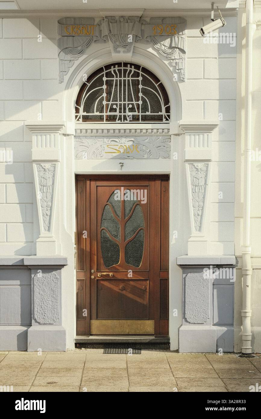 View of a front door of an old building in daylight, entrance door ...