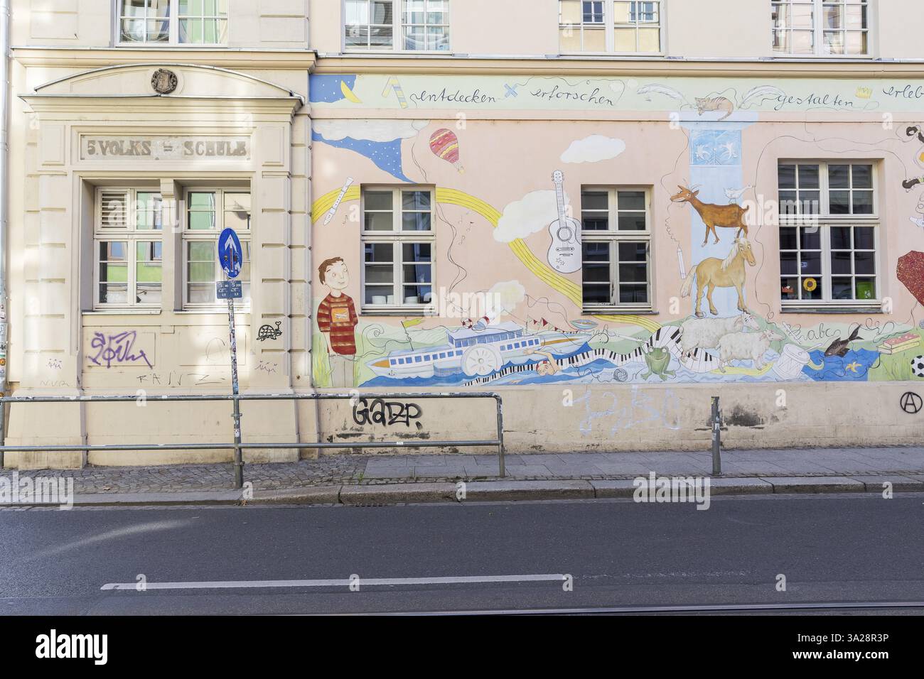 Colourful facade painting with motifs for children at the 15th primary ...