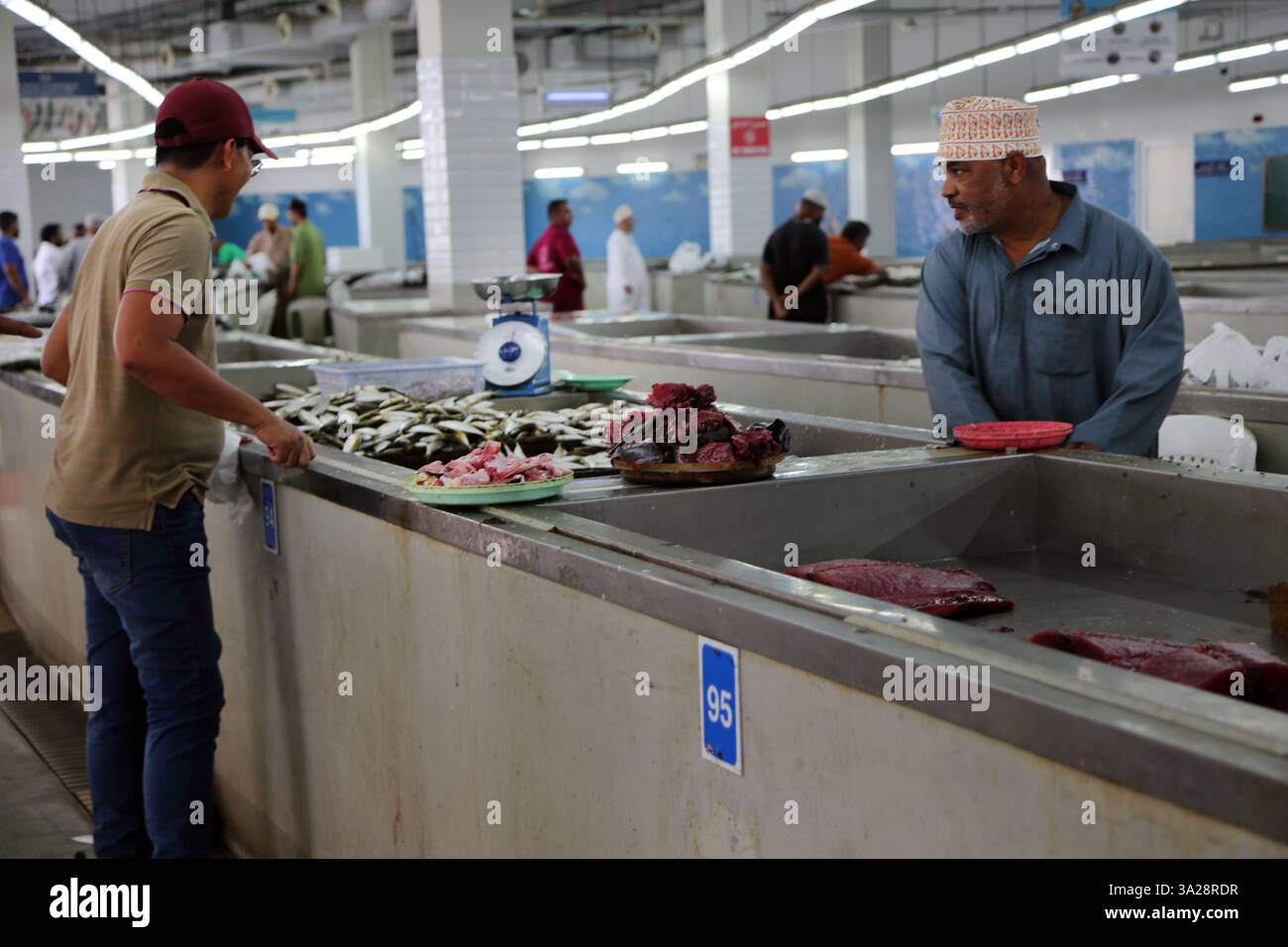 Omani Selling Fish at Mutrah Fish Souk Muscat Oman Stock Photo - Alamy