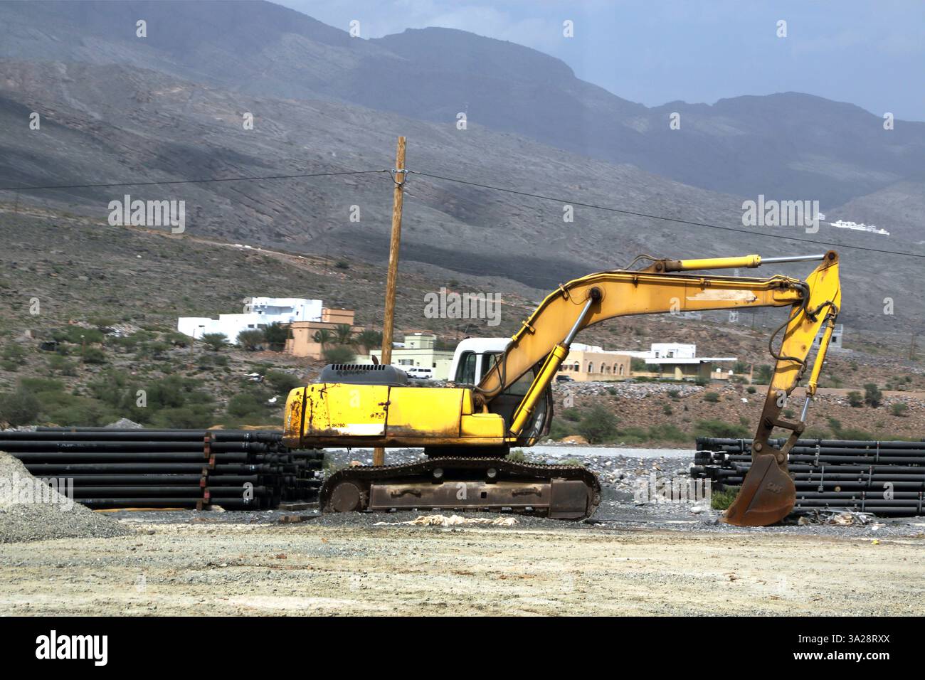 Wadi Ghul Hajar Mountains Al Hamra Diger and Cables Stock Photo - Alamy